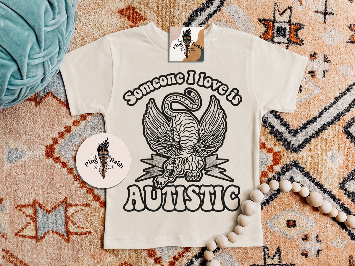« SOMEBODY I LOVE IS AUTISTIC (TIGER) » KIDS/YOUTH TEE | The Pine Torch